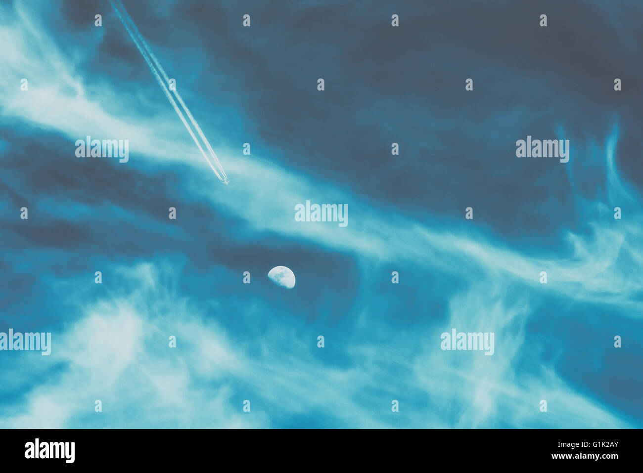 Airplane Flying To The Moon Concept On Blue Sky With Clouds Stock Photo ...