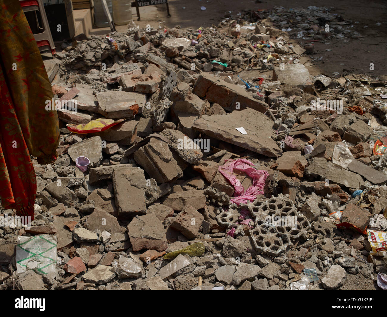 Rubble from the hand demolition of shops in the district of Paharjani ...