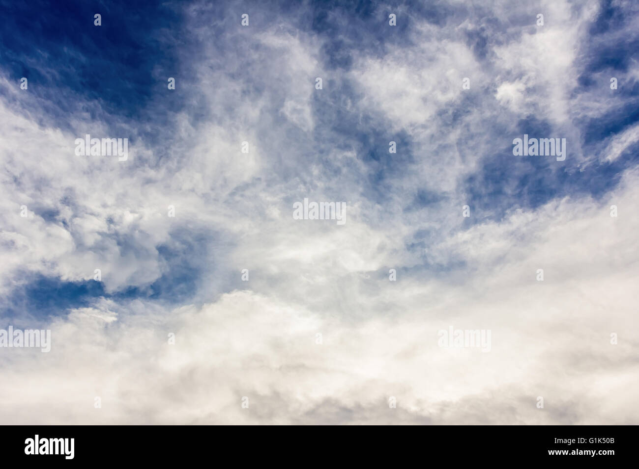 Blue sky with clouds background Stock Photo - Alamy