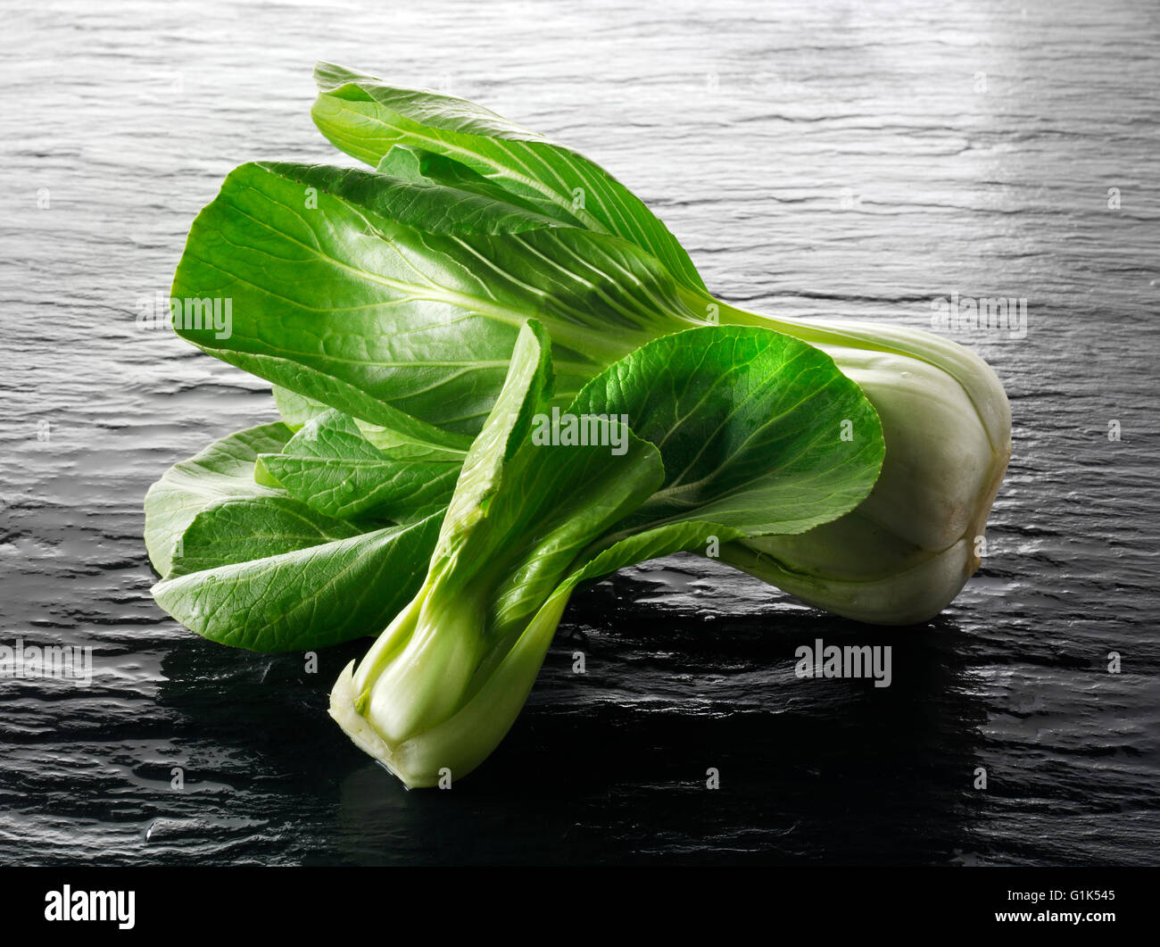 Fresh whole Pak Choi Leaves Stock Photo - Alamy