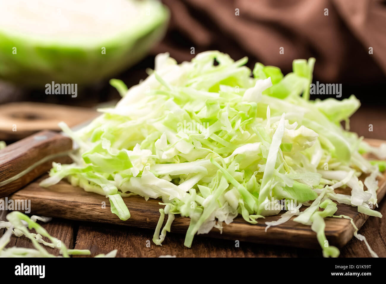 Savoy cabbage is chopped hi-res stock photography and images - Alamy