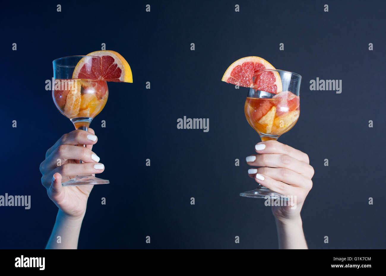 Hand holding drink cocktail hi-res stock photography and images - Alamy