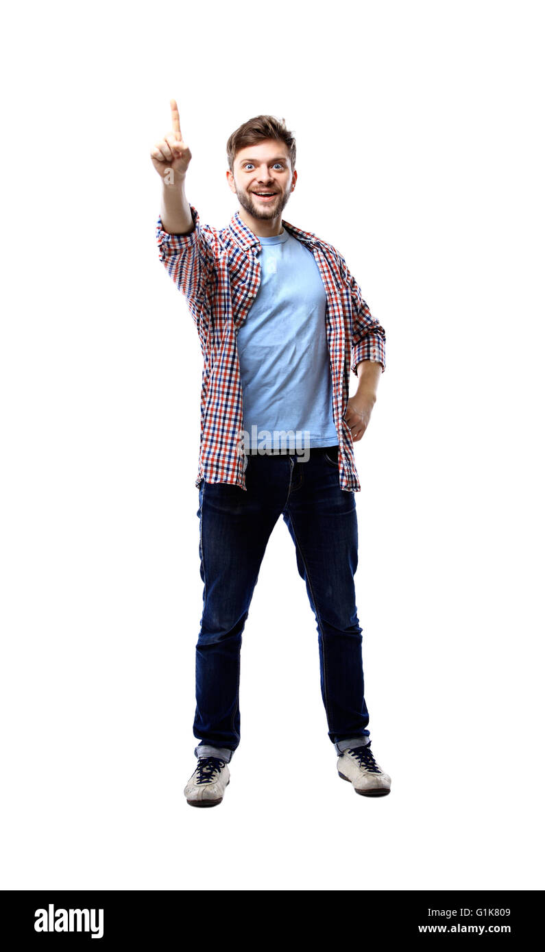 Excited young man pointing finger Cut Out Stock Images & Pictures - Alamy
