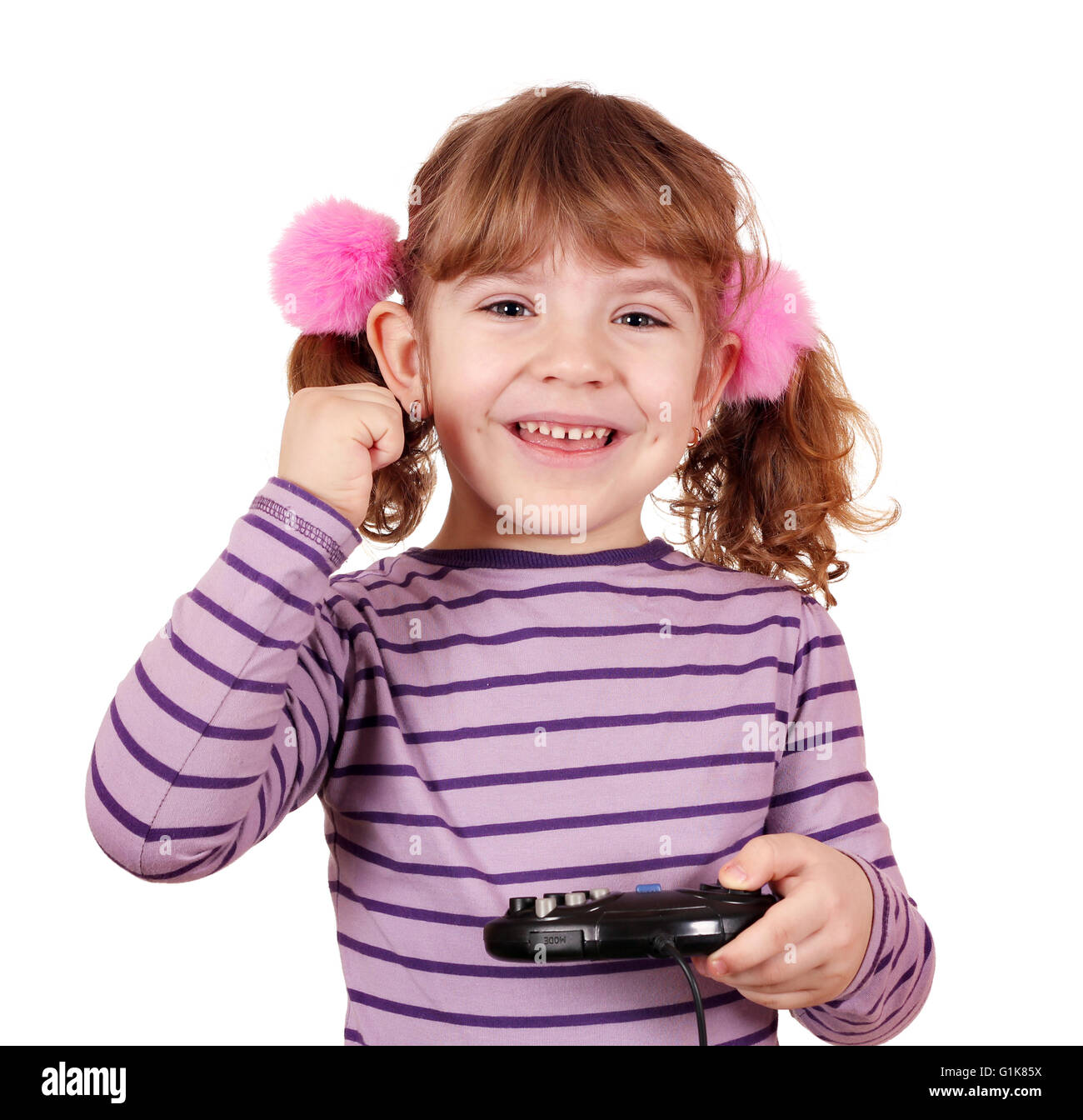 happy little girl play video game and win Stock Photo - Alamy