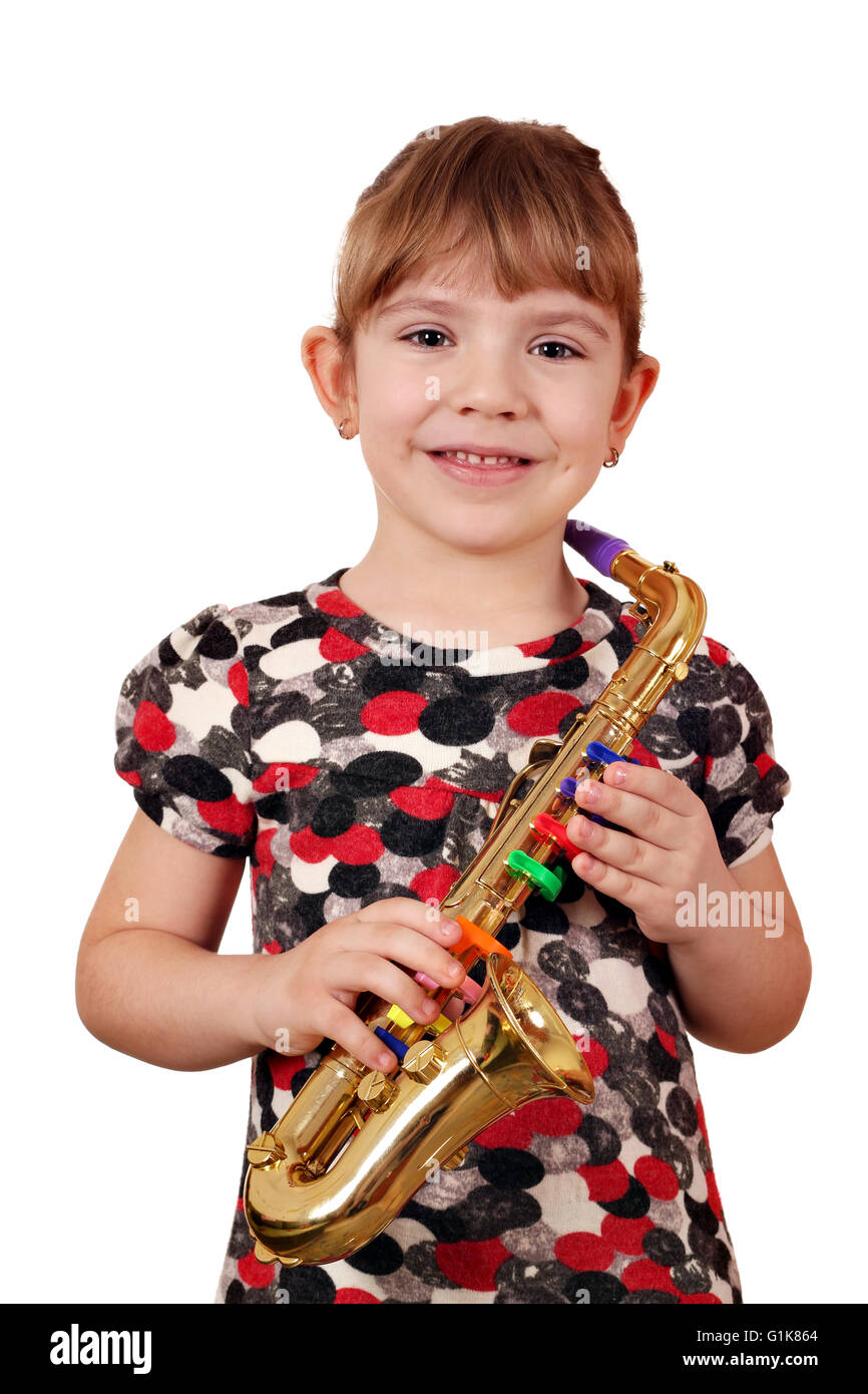 happy little girl with saxophone posing Stock Photo - Alamy