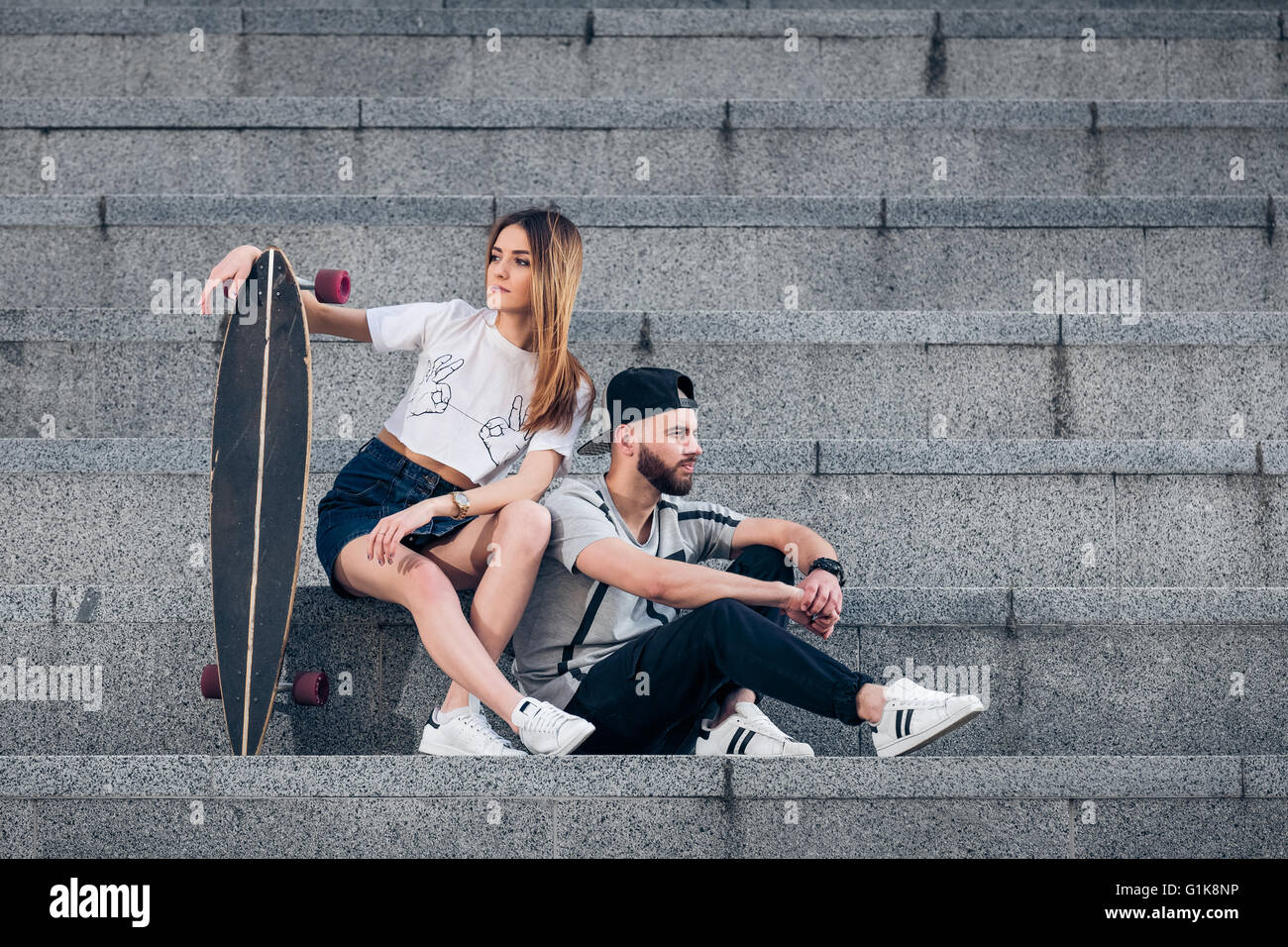 Couple walking on stairs hi-res stock photography and images - Alamy