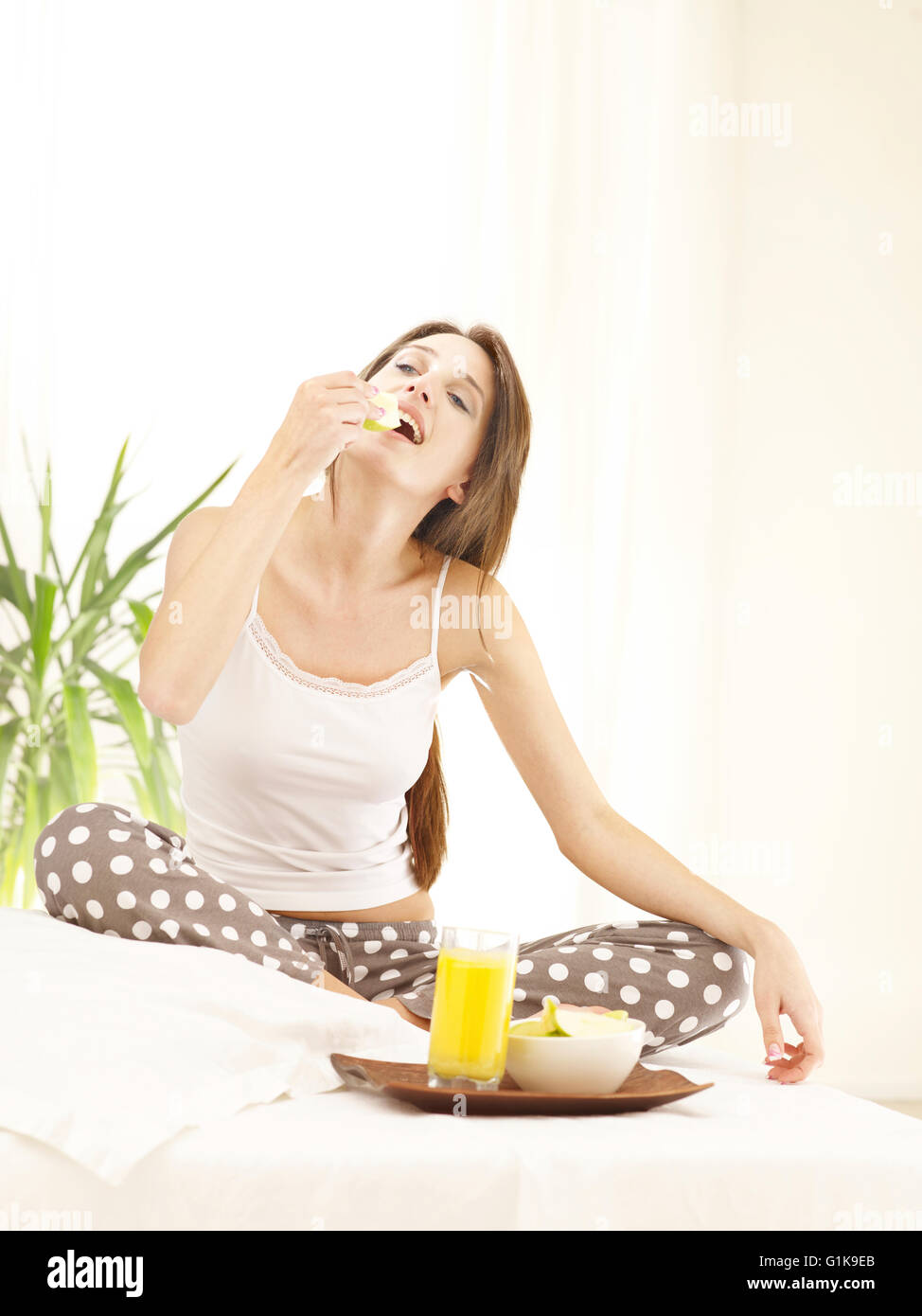 Morning girl in a bed Stock Photo - Alamy