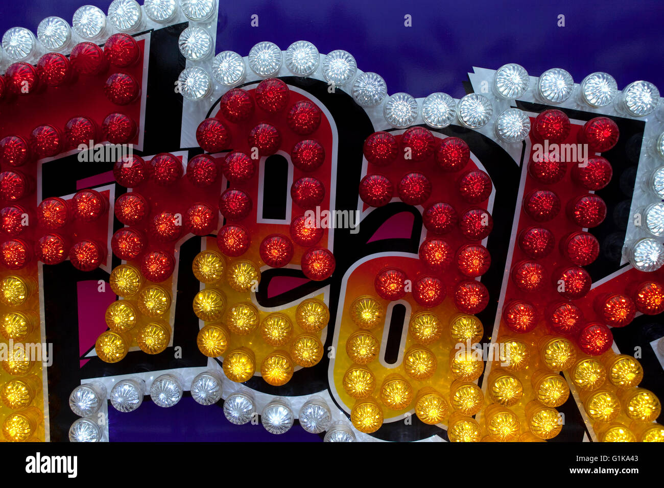 Close up of neon sign and bulbs on a ride in a fairground Stock Photo ...