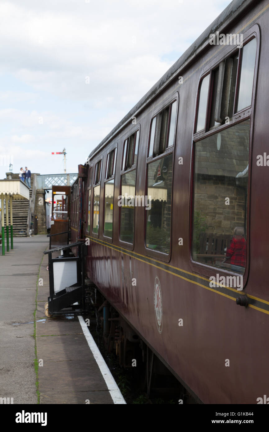 Access from a low platform to a heritage train on the preserved Embsay ...