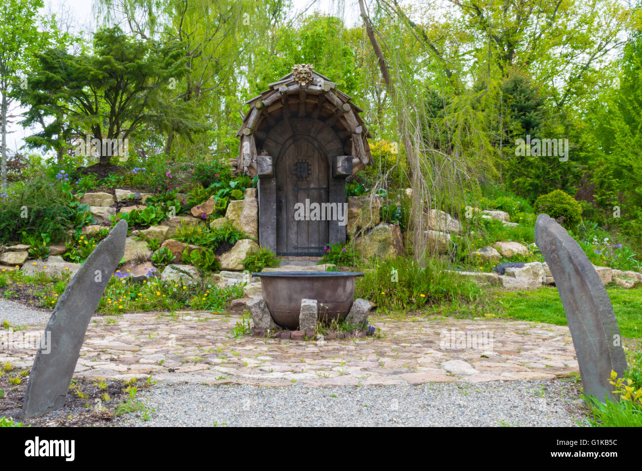 The entrance to a witches hut sits in the center of the woods with a ...