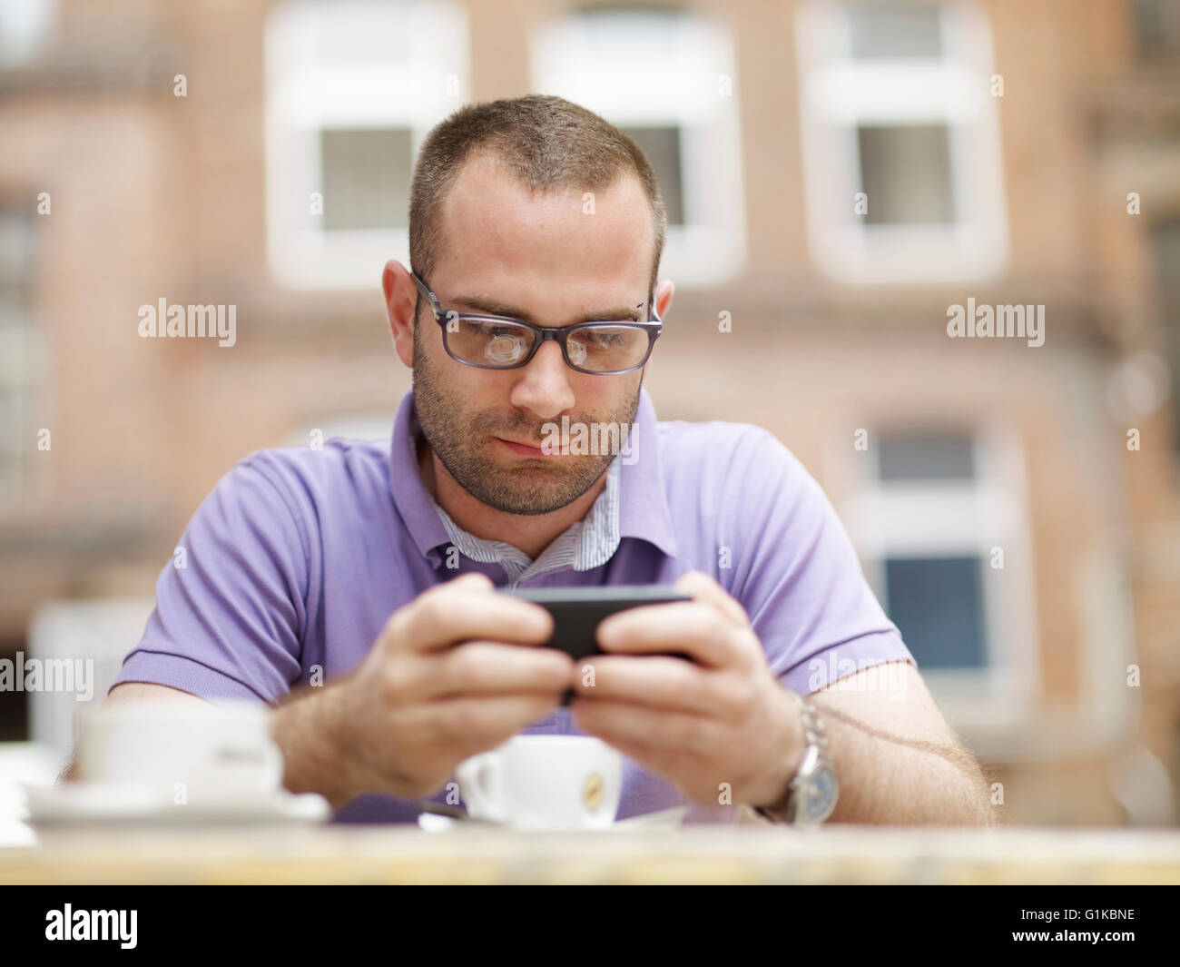Smart handsome man using hi-res stock photography and images - Alamy