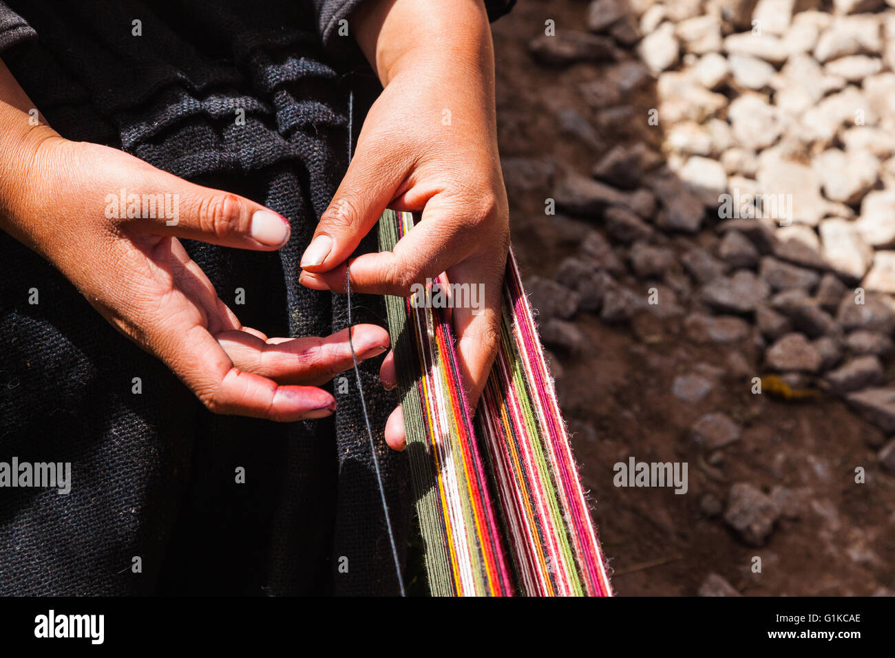 Preparing the warp threads before the start of weaving Stock Photo - Alamy