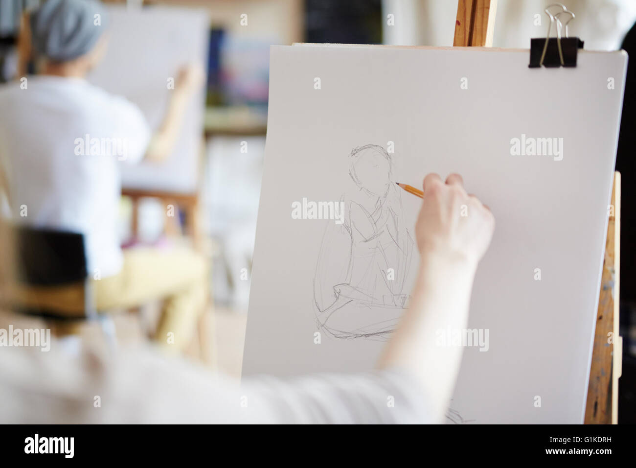 Human easel hi-res stock photography and images - Alamy