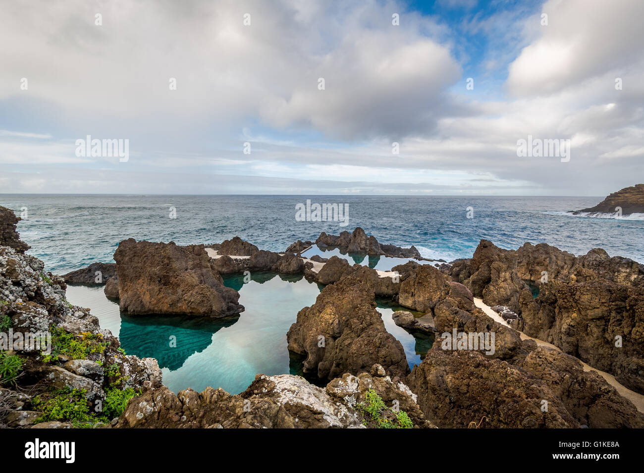 Natural volcanic pools with sea water in Porto Moniz Stock Photo - Alamy