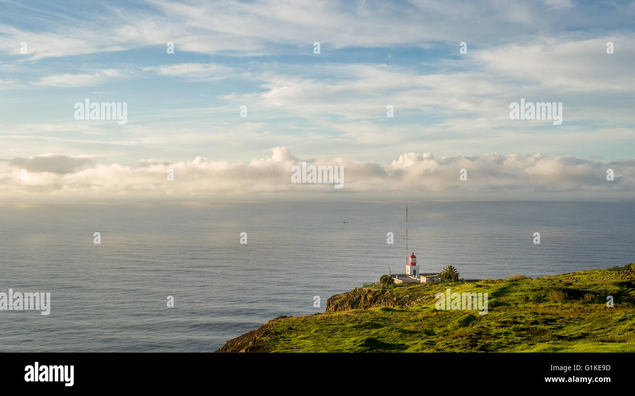 Evening seascape with lighthouse Stock Photo - Alamy