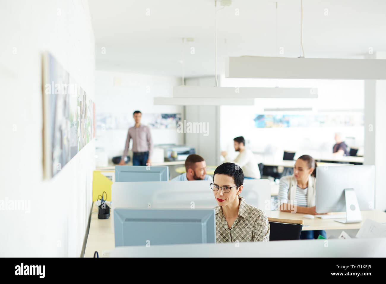 Working in modern office Stock Photo - Alamy
