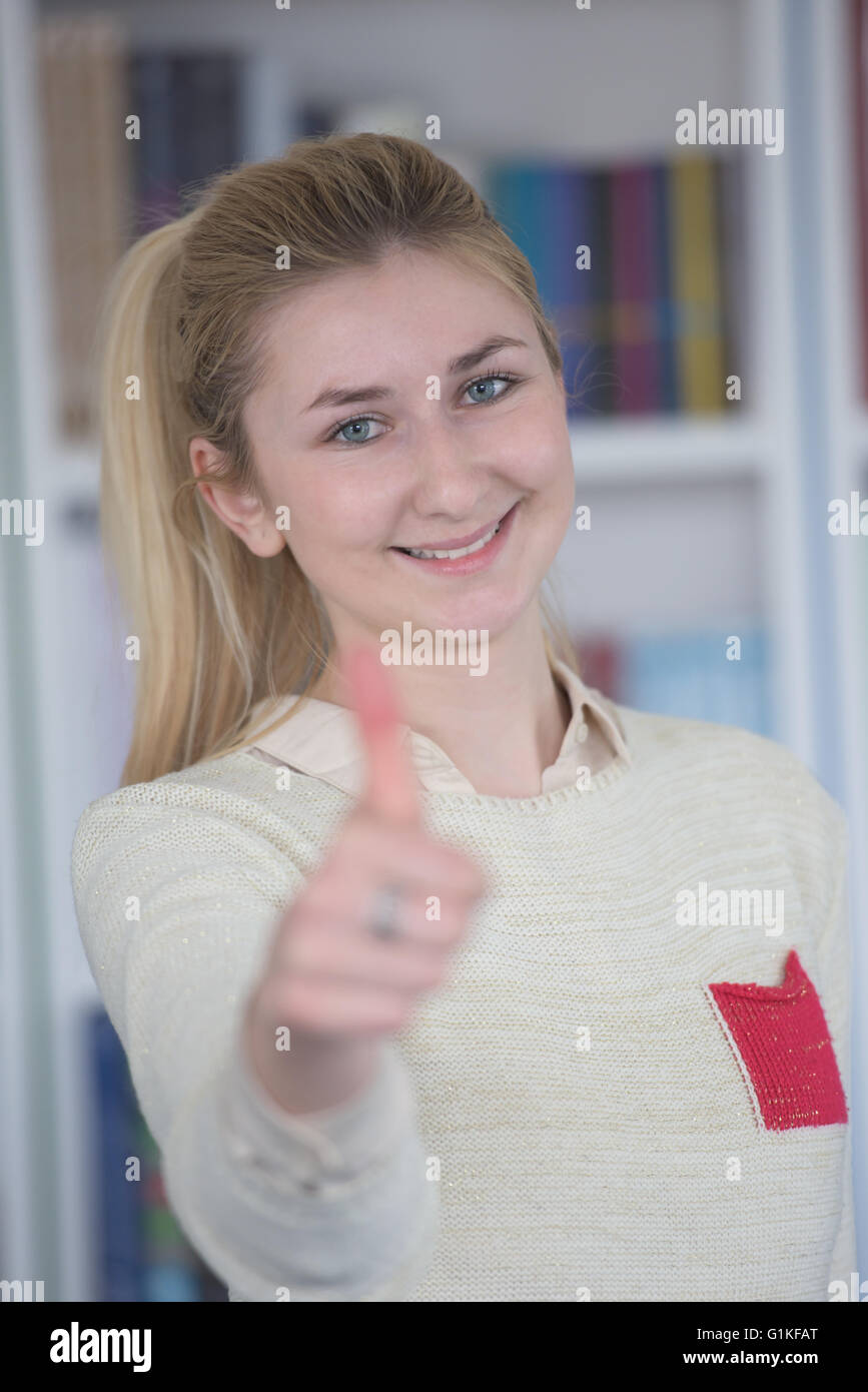 portrait of happy smilling female student girl in school library Stock ...