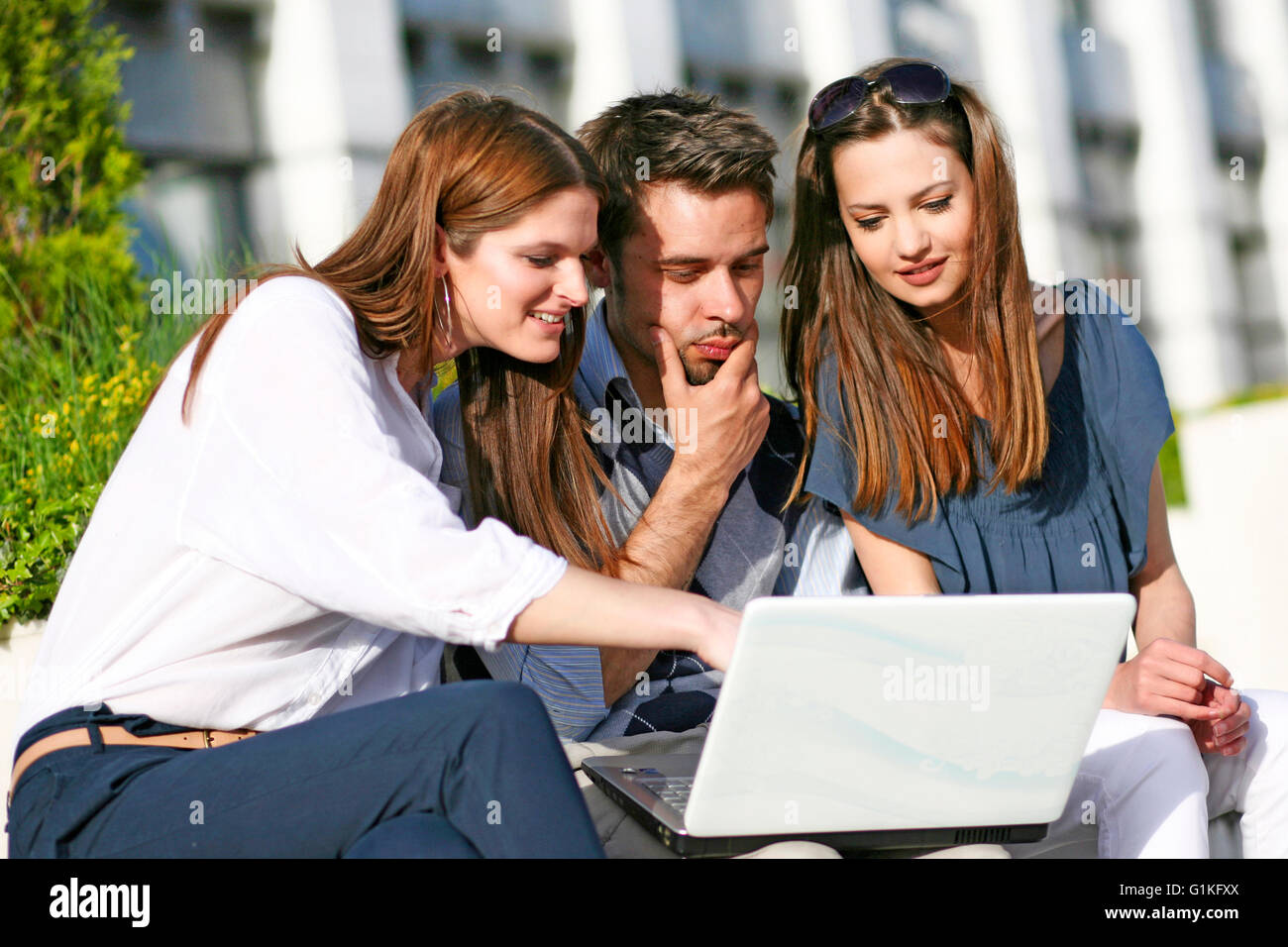 Students working outside Stock Photo - Alamy