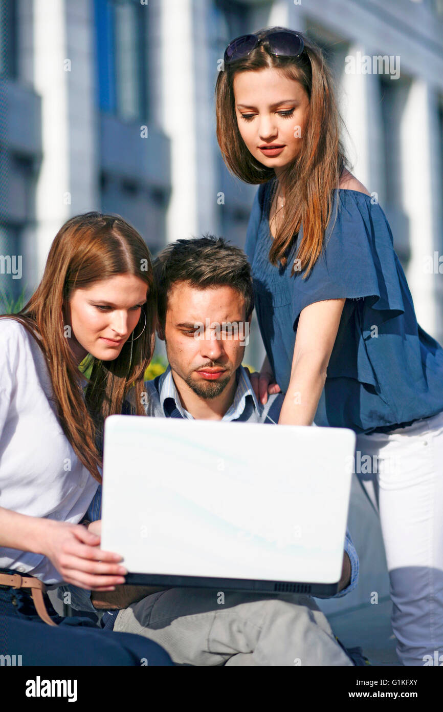Students working outside Stock Photo - Alamy