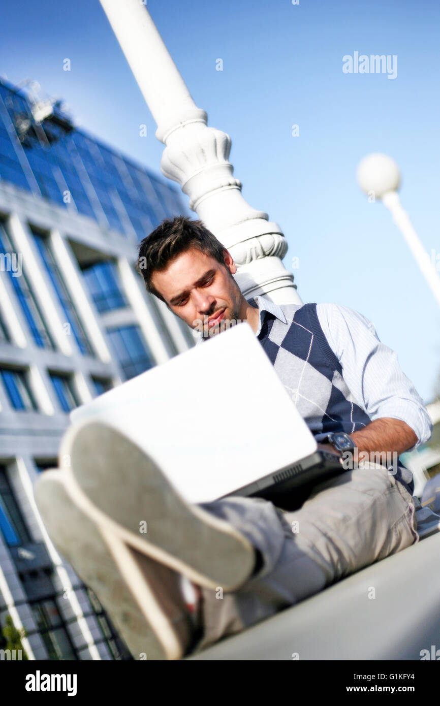 Student working outside Stock Photo - Alamy