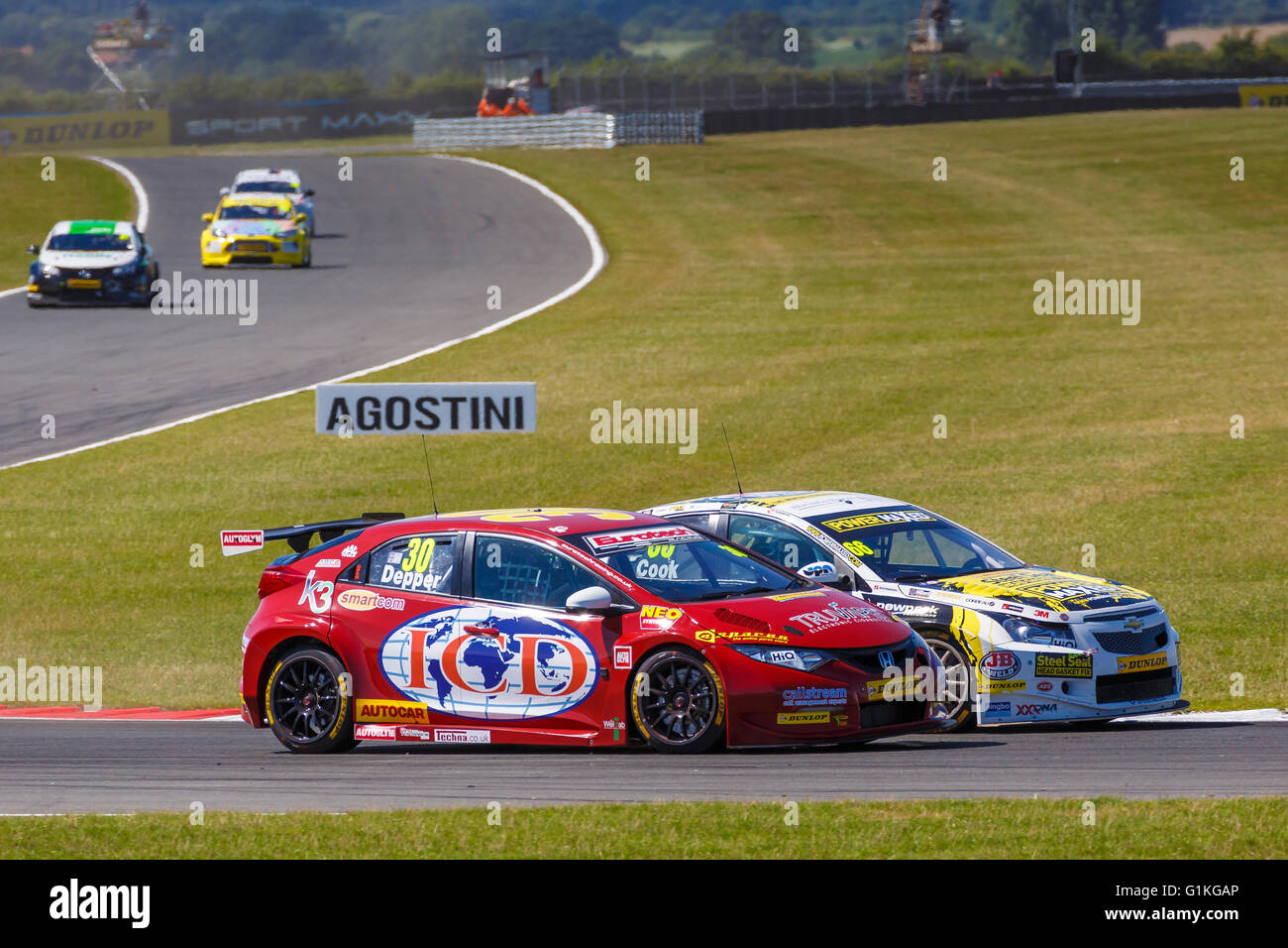 Martin Depper in the Honda Civic goes around the outside of Josh Cook ...