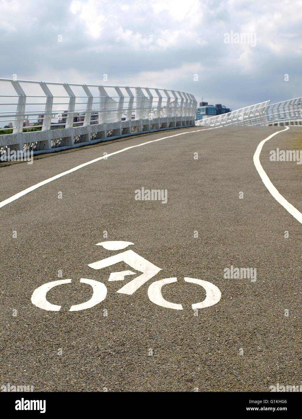 A modern curved bridge designed for cyclists Stock Photo - Alamy