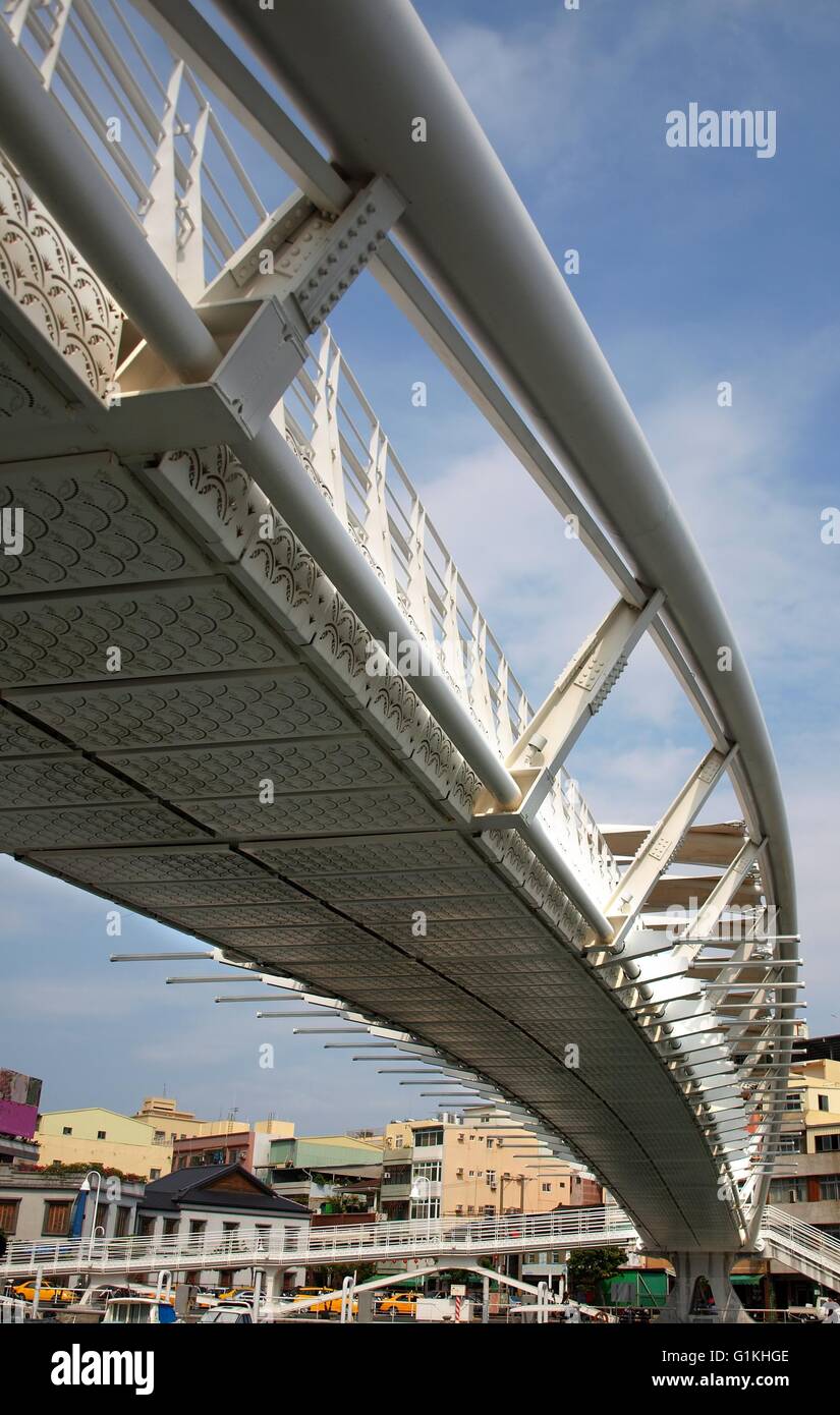 A curved bridge in contemporary design for pedestrians Stock Photo - Alamy
