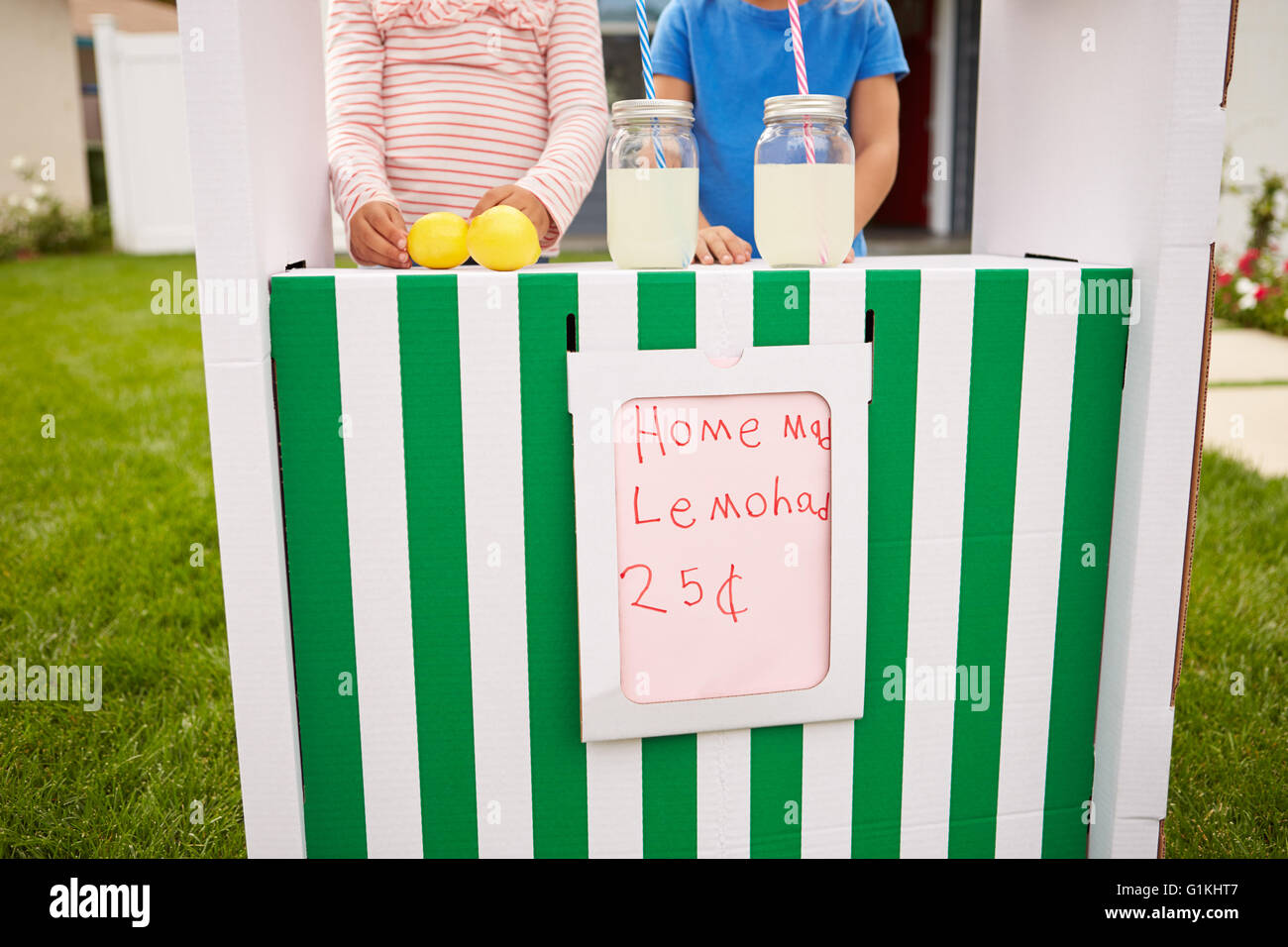 Two Girls Running Homemade Lemonade Stand Stock Photo - Alamy