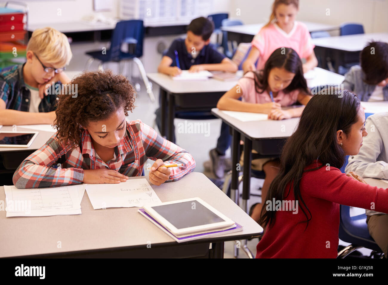 Elevated view of teacher and kids in elementary school class Stock ...