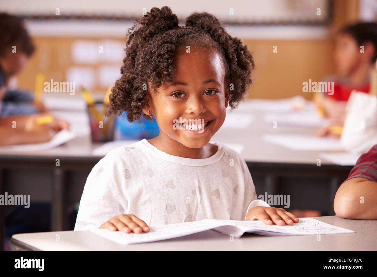 Portrait of African American elementary school girl in class Stock ...