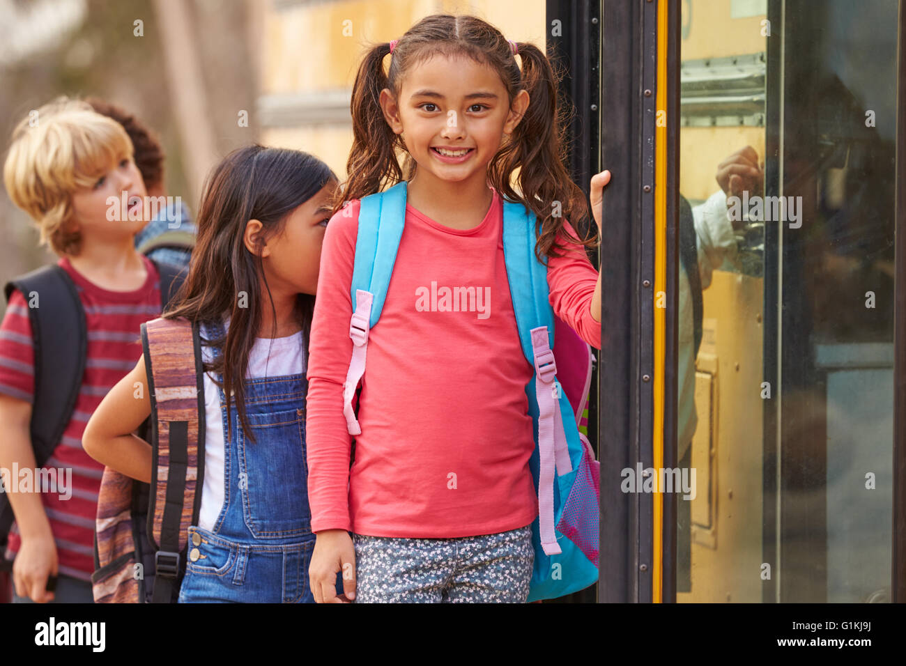 Bus queue kids hi-res stock photography and images - Alamy