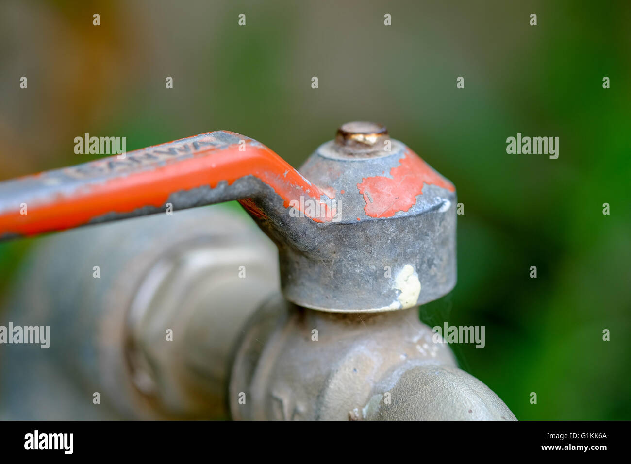 Water Meter with red handle galvanised steel Stock Photo - Alamy