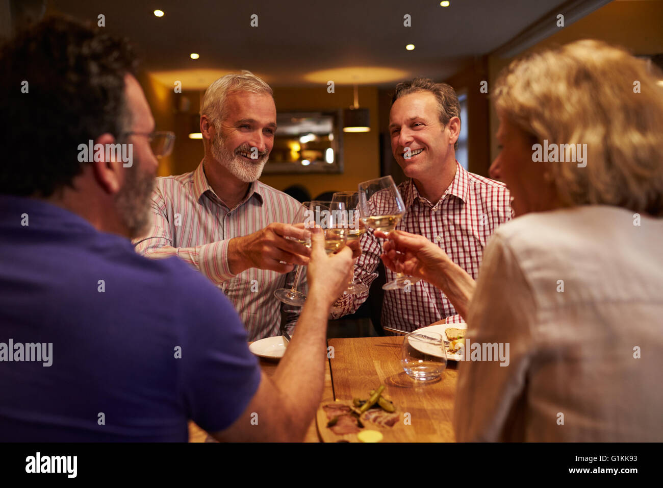 Gay couple toast hi-res stock photography and images - Alamy