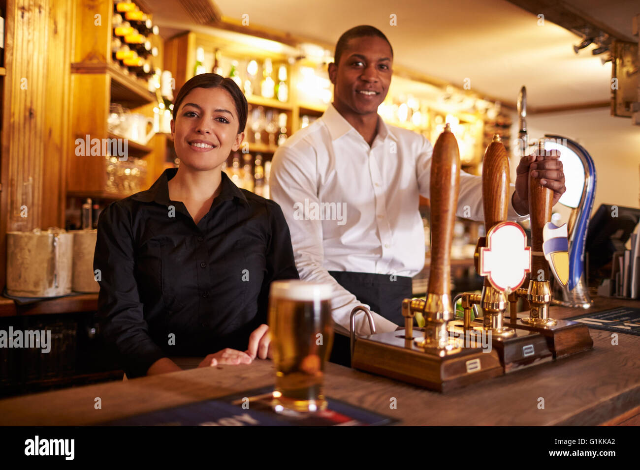 Behind a bar hi-res stock photography and images - Alamy