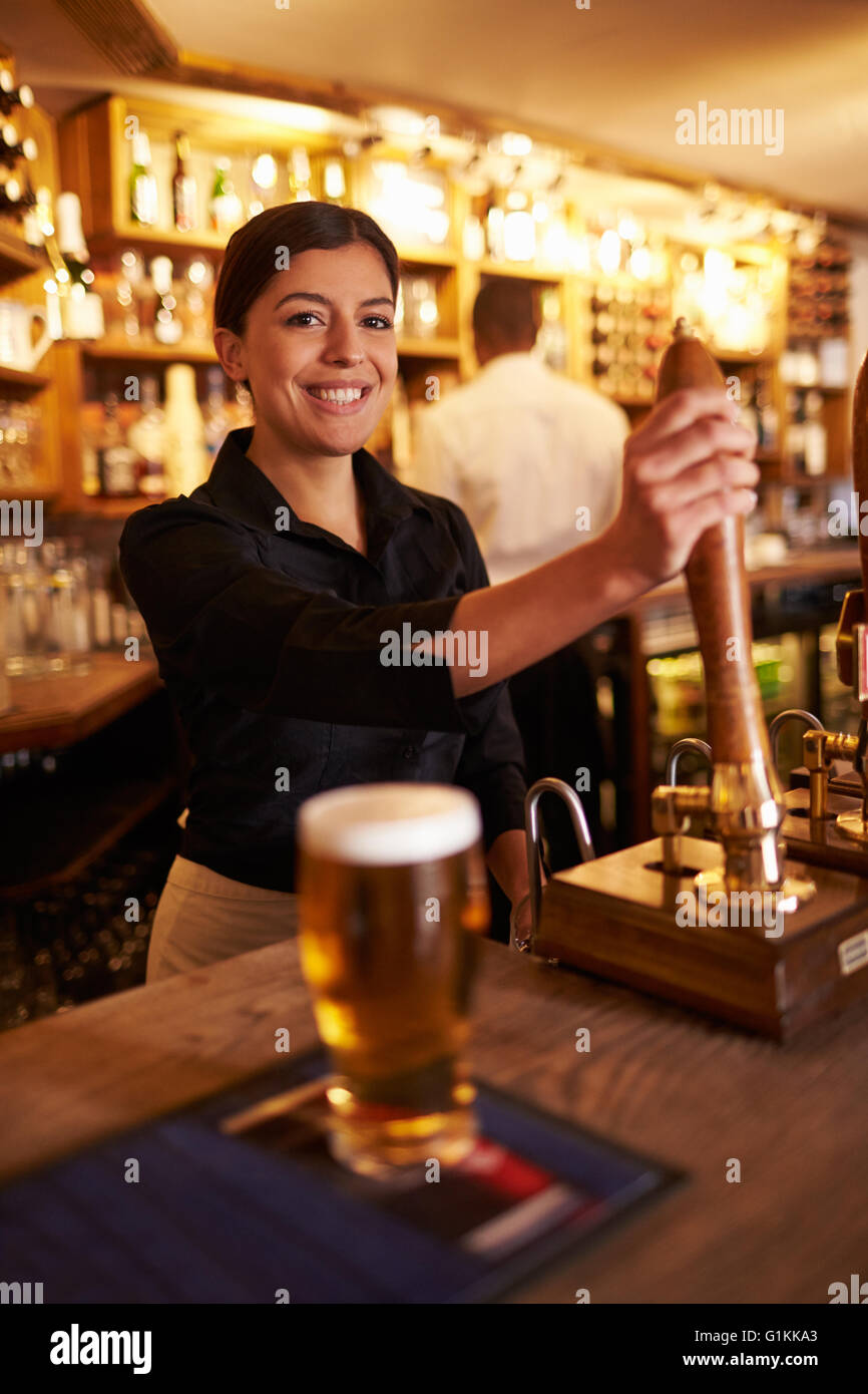 Behind a bar hi-res stock photography and images - Alamy