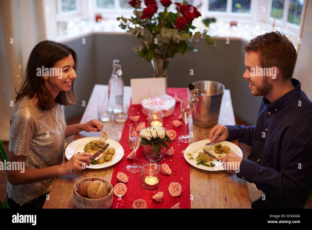 Romantic Couple Enjoying Valentines Day Meal Together Stock Photo - Alamy
