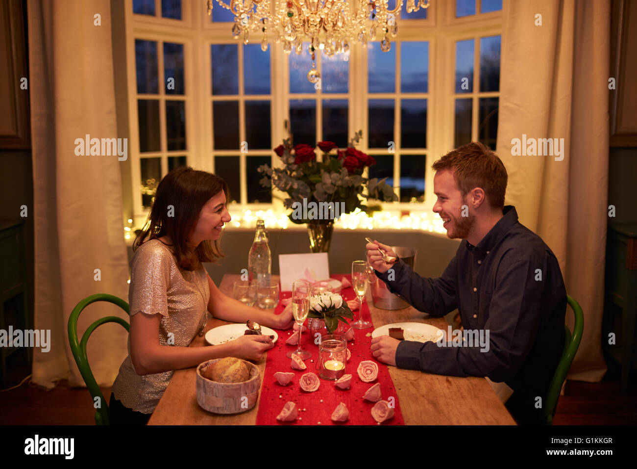 Romantic Couple Enjoying Valentines Day Meal Together Stock Photo - Alamy