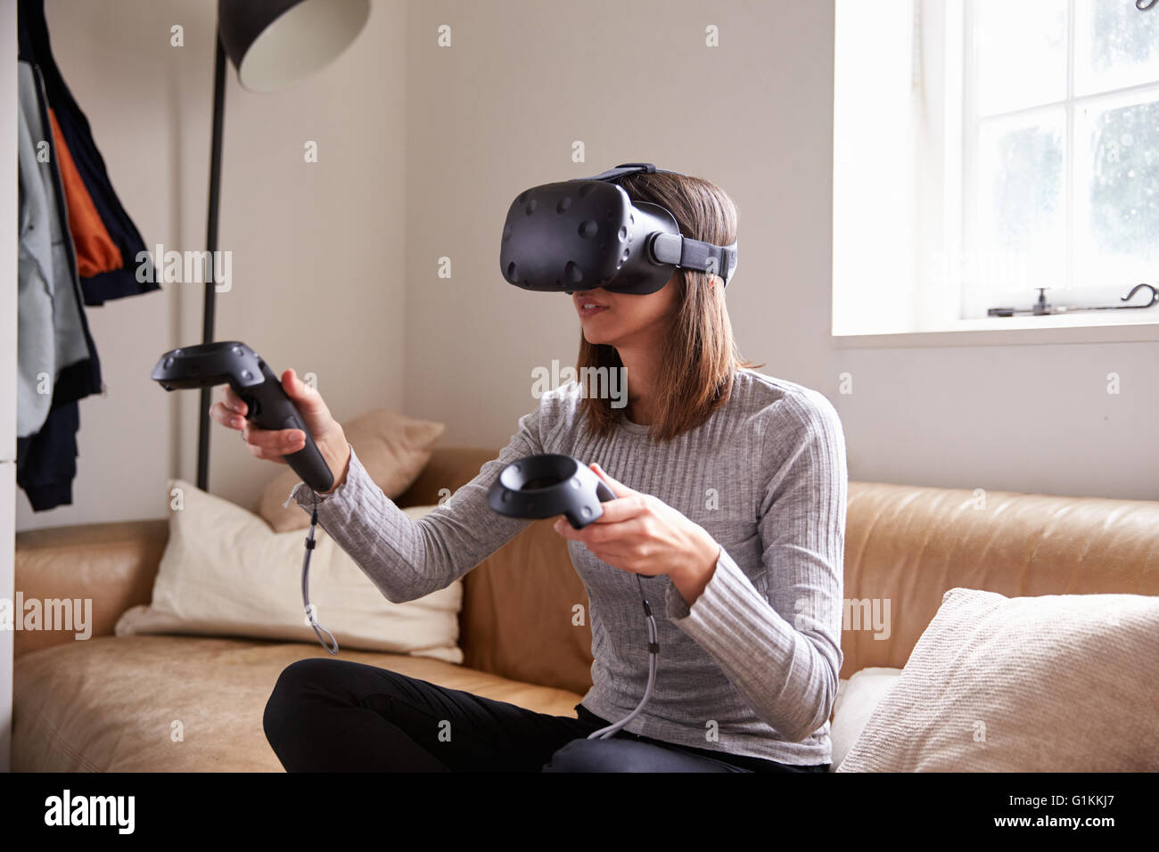 Man In Studio Wearing Virtual Reality Headset Playing Game Stock Photo ...