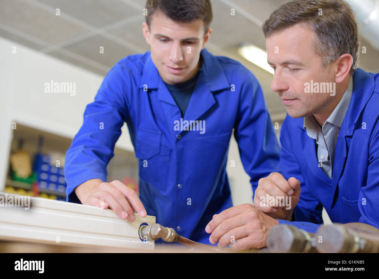 men in overalls Stock Photo - Alamy
