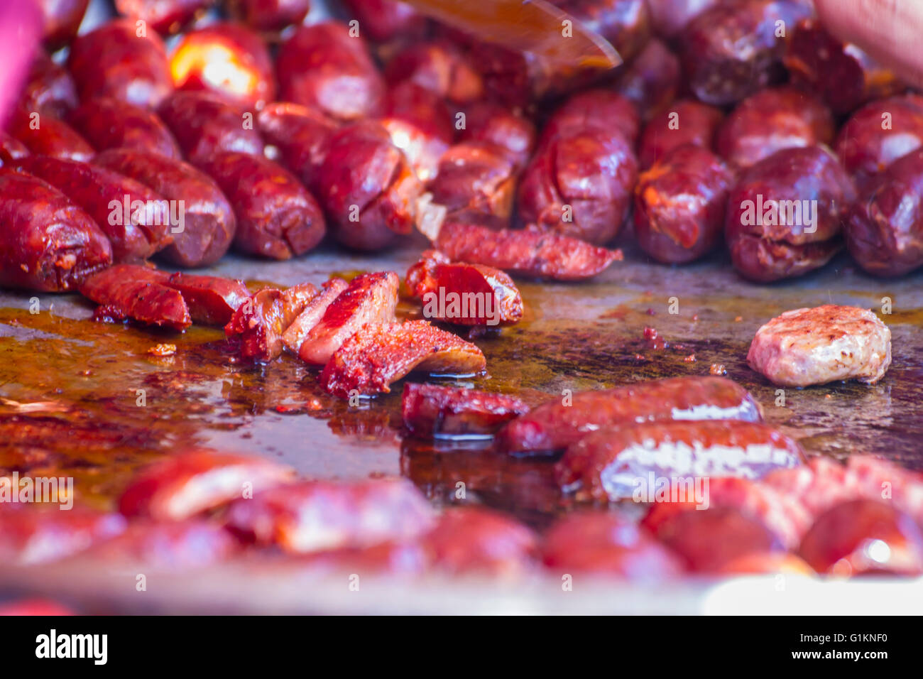 Grilled artisan sausages in a medieval fair Stock Photo - Alamy
