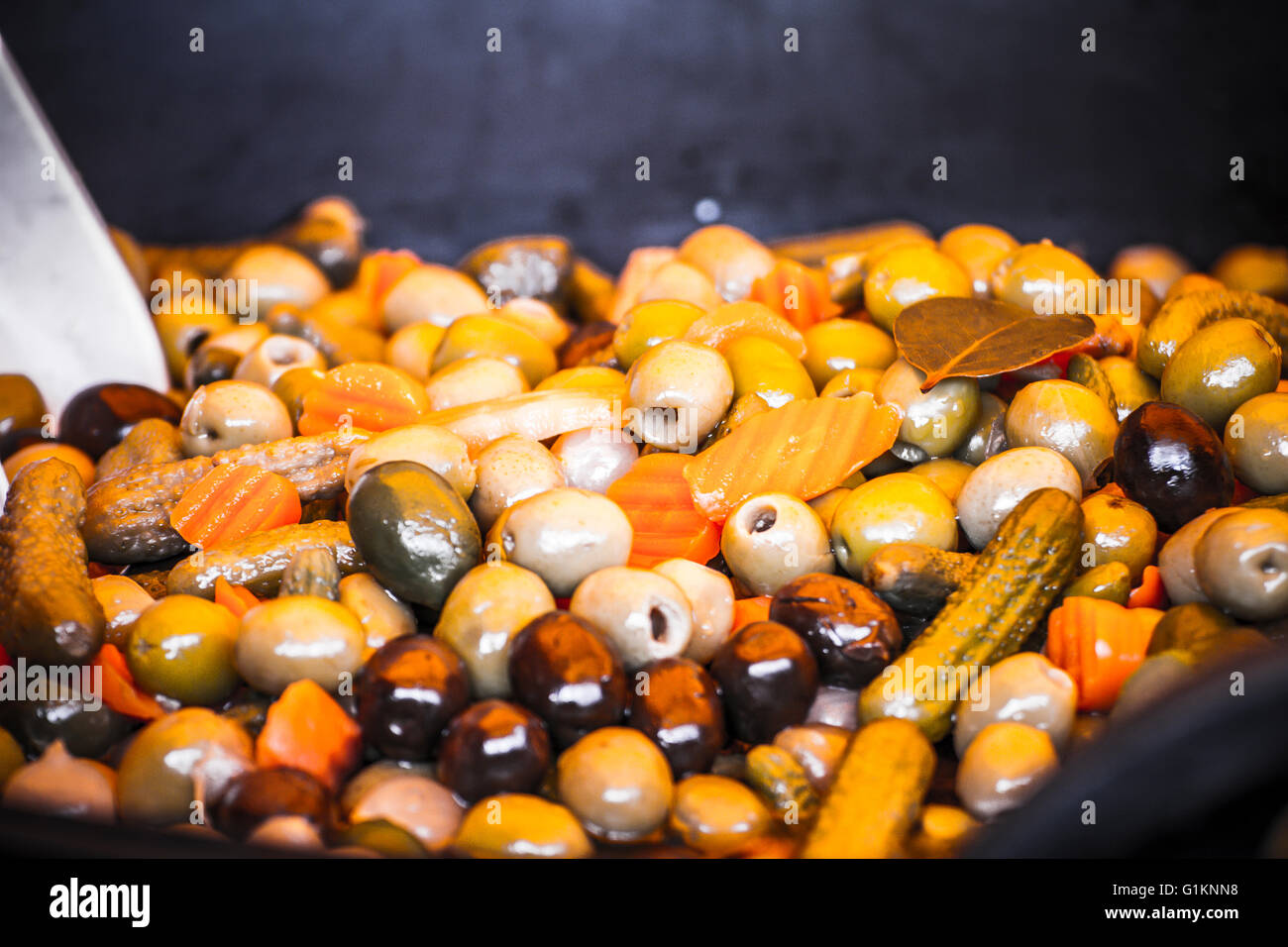 Wooden drums with olives and variants Stock Photo - Alamy