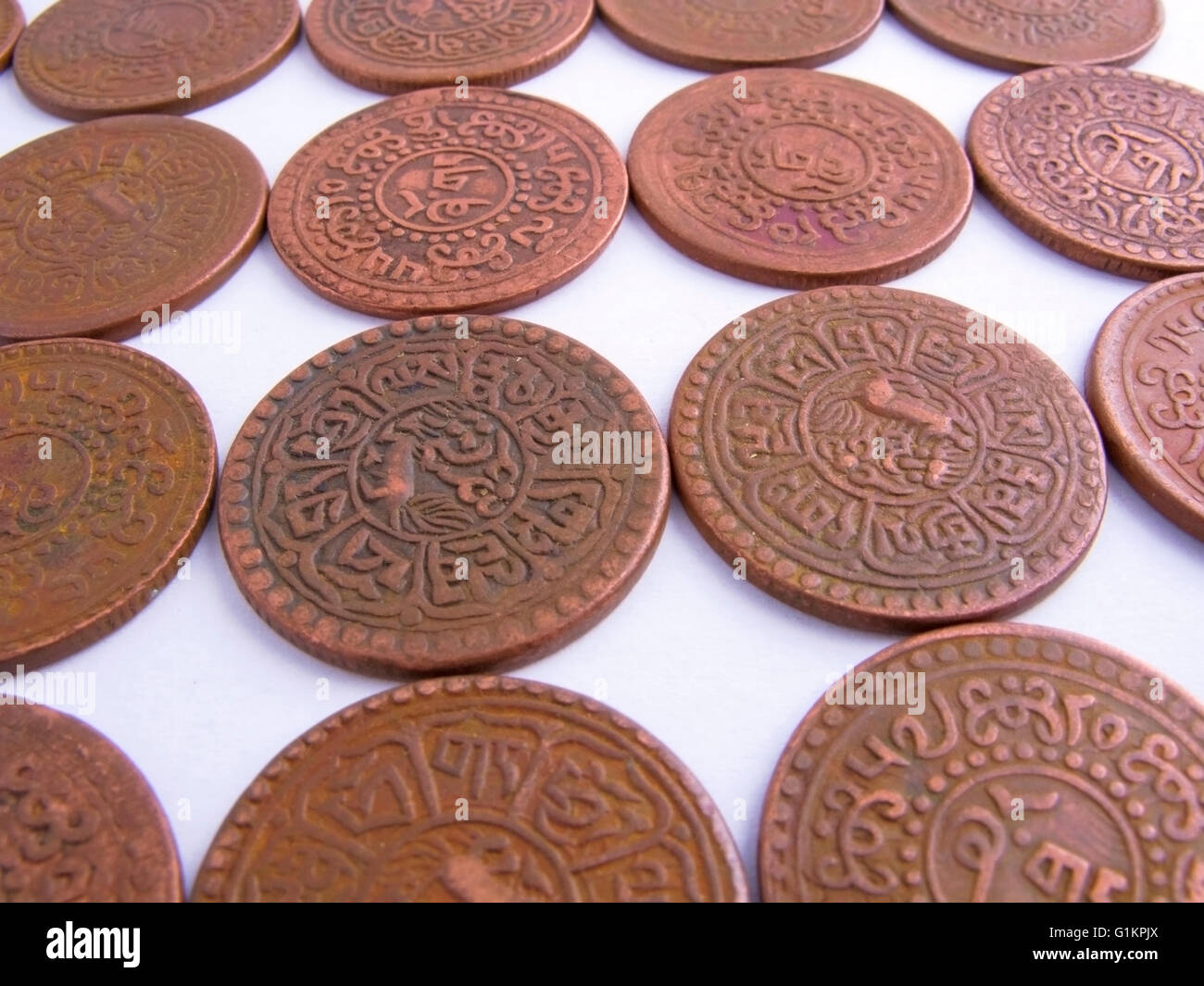 Tibetan coin hi-res stock photography and images - Alamy
