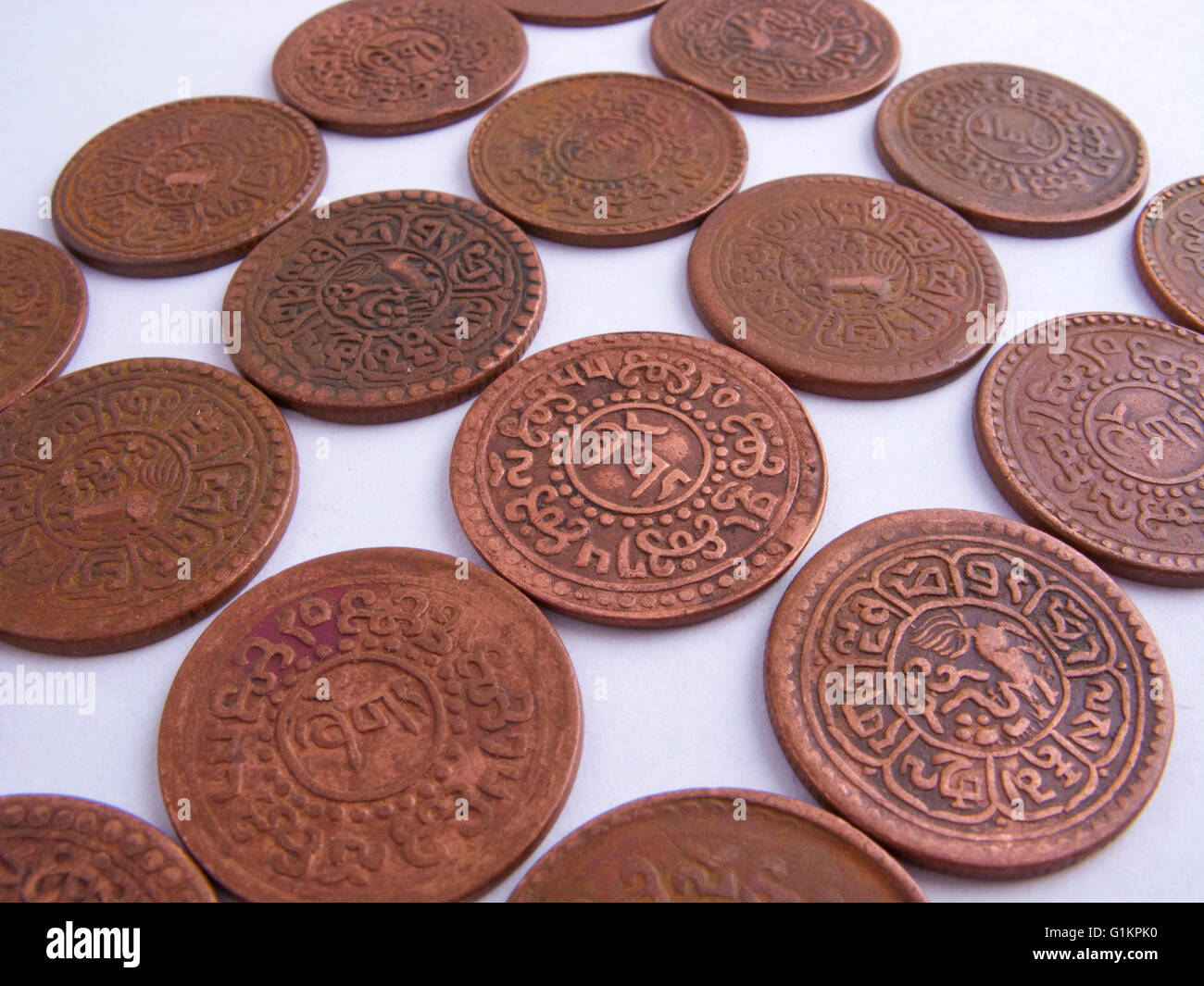 Tibetan coin hi-res stock photography and images - Alamy