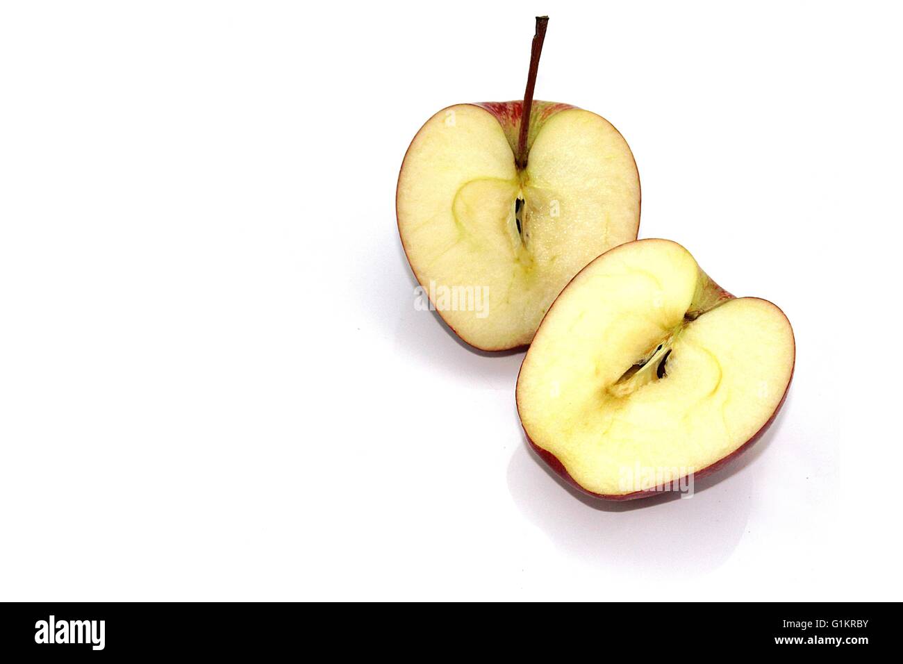 cut apple on white Stock Photo - Alamy