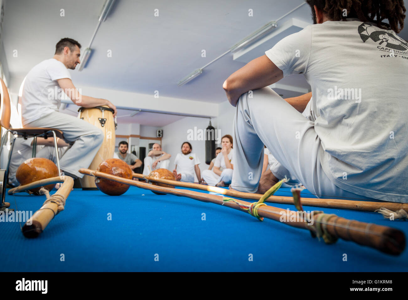 Birimbao, ropes and roda in the capoeira game. Athens, Central Athens ...