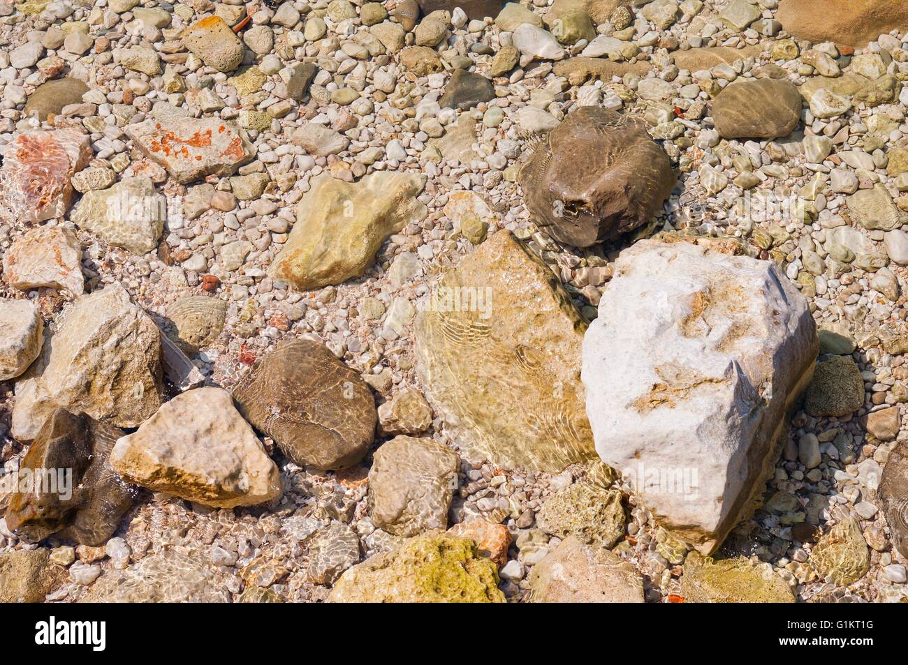 Stones of various size on the beach. Natural background. Podgora ...
