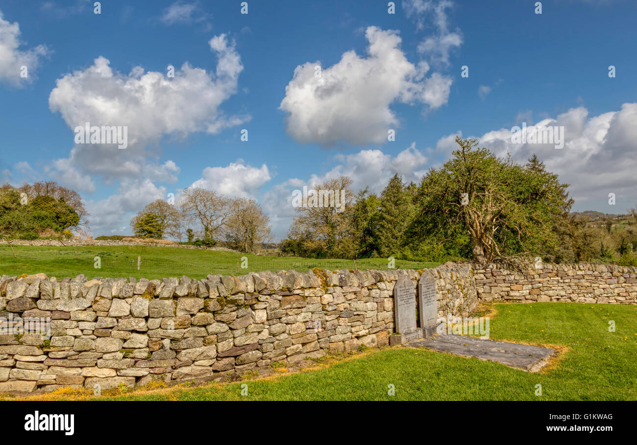 Graves in the cemetery of Jerpoint Park, the location of The Lost Town ...