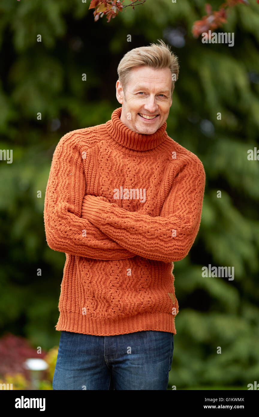 Portrait of a man stood smiling outdoors Stock Photo - Alamy
