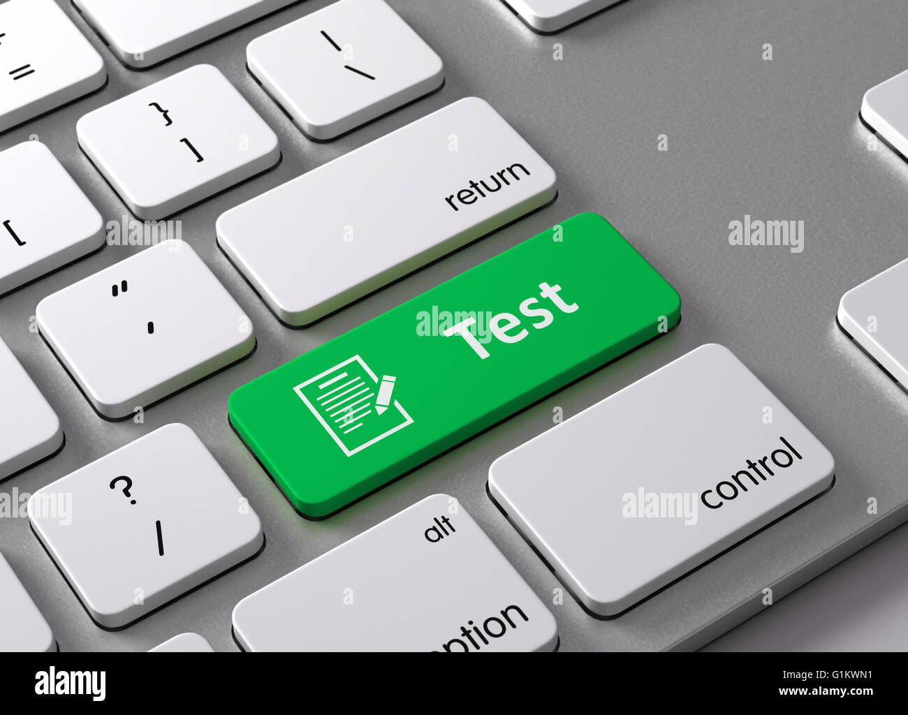 A keyboard with a green button Test Stock Photo - Alamy