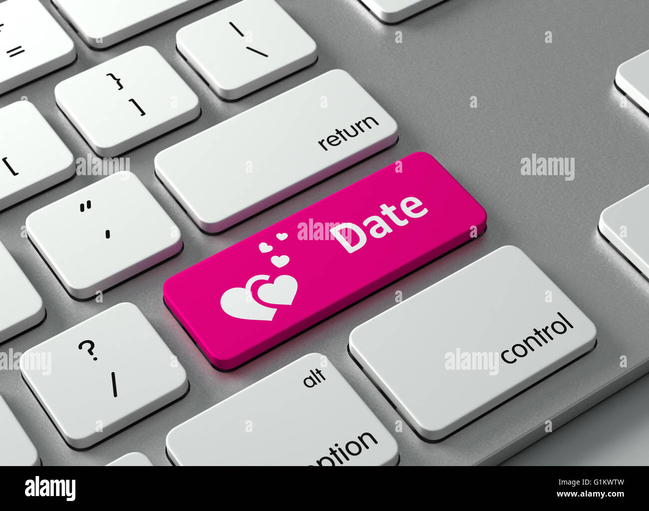 A keyboard with a pink button Date Stock Photo - Alamy